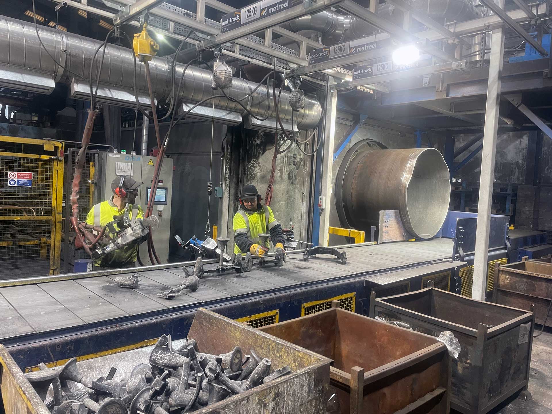 First AUMUND Flat Plate Conveyor in UK foundry - AUMUND Group